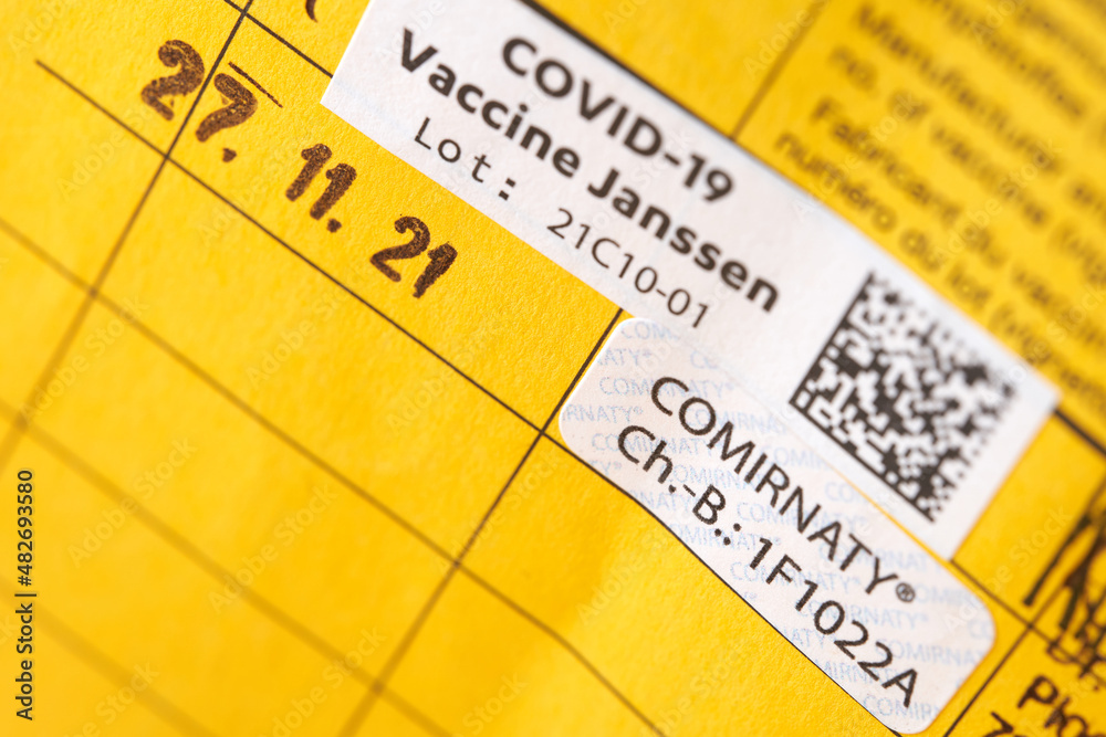 Booster vaccination against Corona covid-19 virus. Yellow vaccination ...