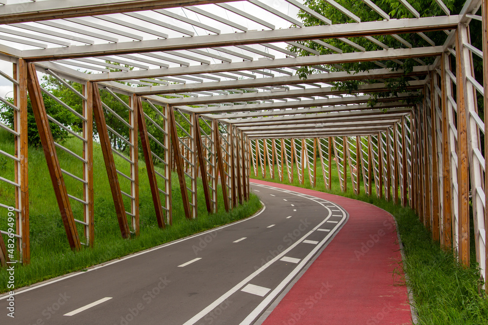Pergola in the Kapotnya district in Moscow, bicycle and pedestrian ...