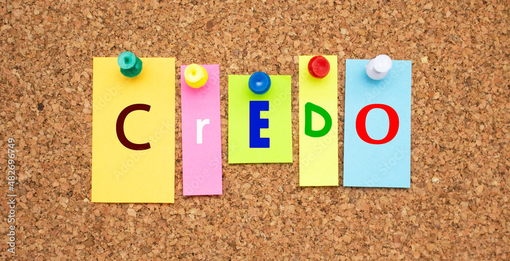 Color notes with letters pinned on a board. Word CREDO. Stock Photo ...