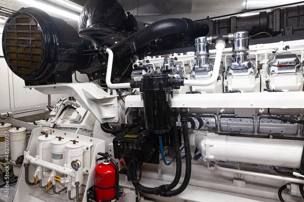 Marine engine installed inside a luxury yacht. Stock Photo | Adobe Stock
