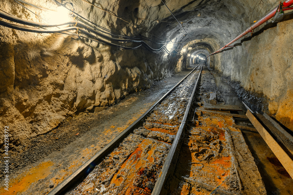 Underground mine. Underground railway for transporting ore. Mine ...