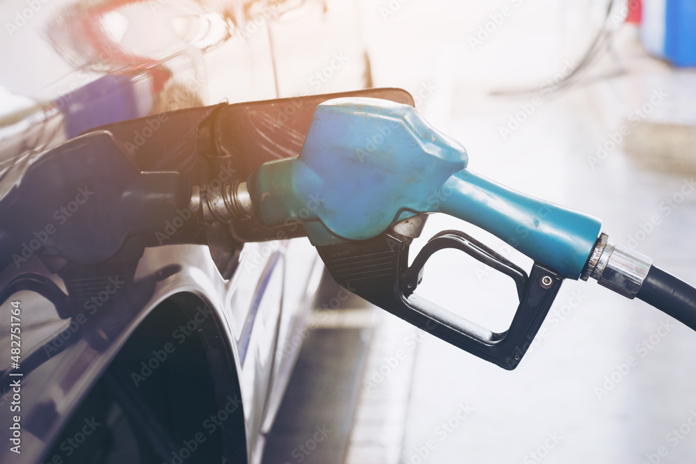 Fotografia do Stock: Selective focus Refueling the car with diesel at a ...