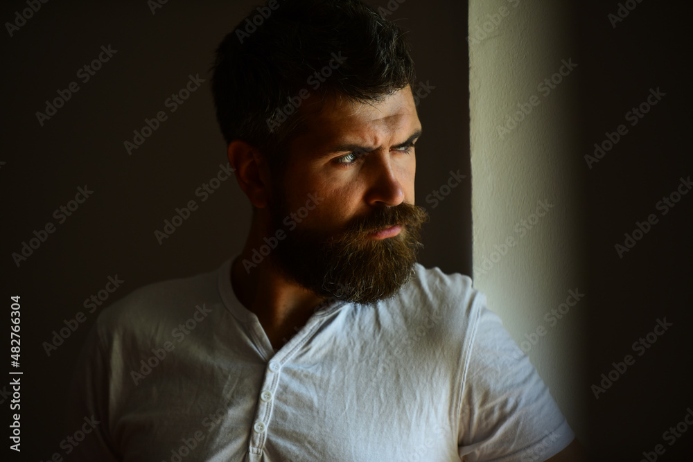 Shadow male face. Close up portrait of guy with serious profile face ...