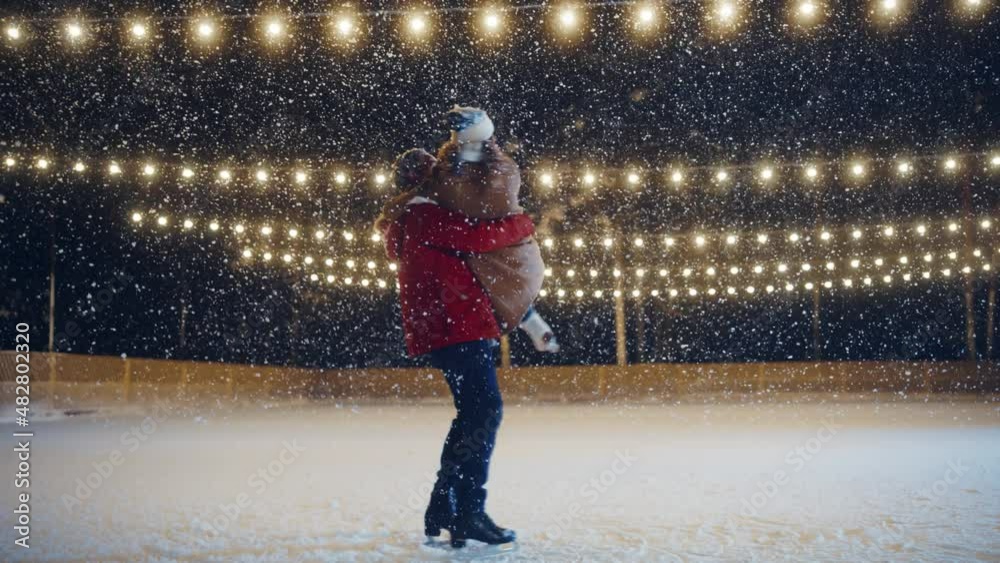 Romantic Winter Snowy Evening: Ice Skating Couple Having Fun on Ice ...