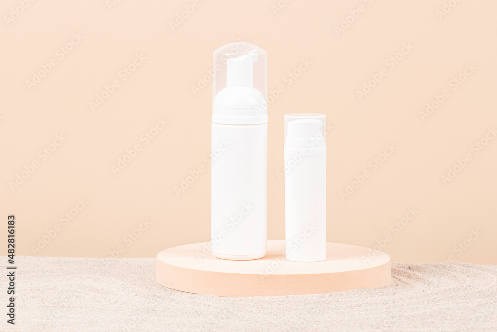 Two white blank plastic packaging cosmetic pump bottles for mousse foam ...