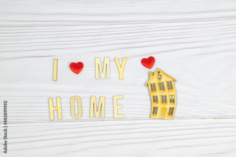 I love my house. Home is best. Background with an inscription and a ...