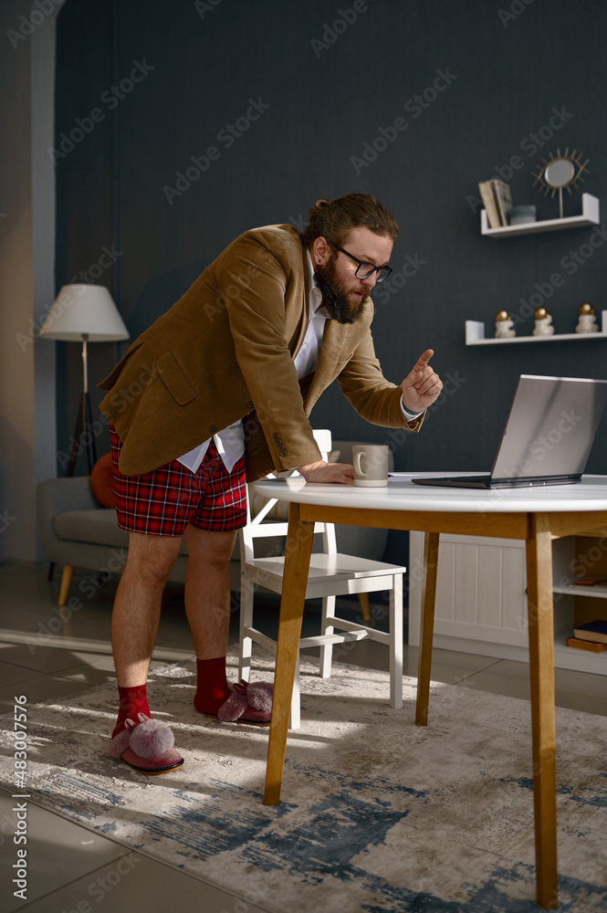 Excited eccentric man freelancer holding video conference Stock Photo ...