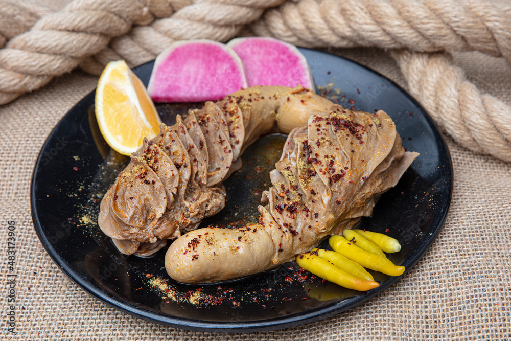 Traditional Turkish Stuffed rice tripe or offal food on the table in ...