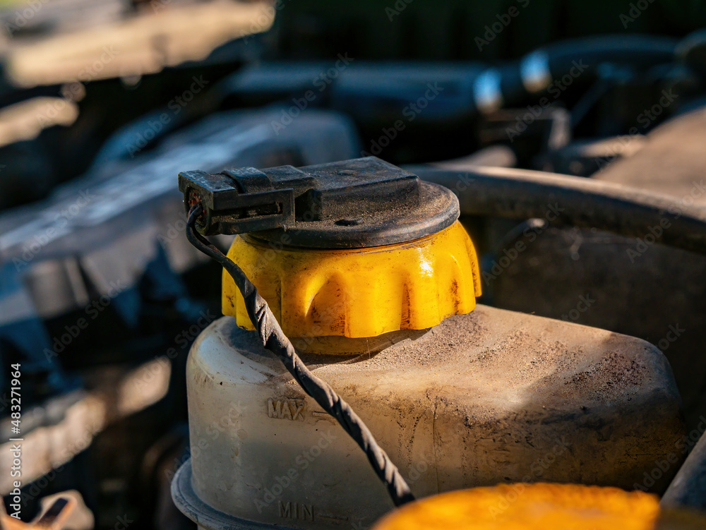 Plastic tank with the brake fluid of the car system. Brake fluid. The ...