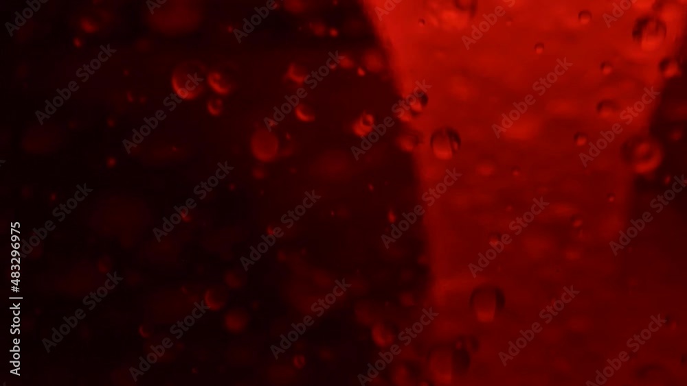 Spinning bubbles of lava or red blood cells inside of an artery. Stock ...