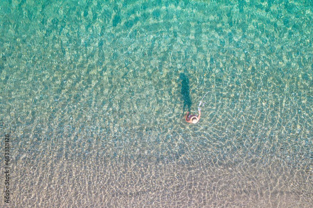 Top View Young Beautiful Naked Woman In A Hat Taking Off Bikini In Sea Water Drone Copter