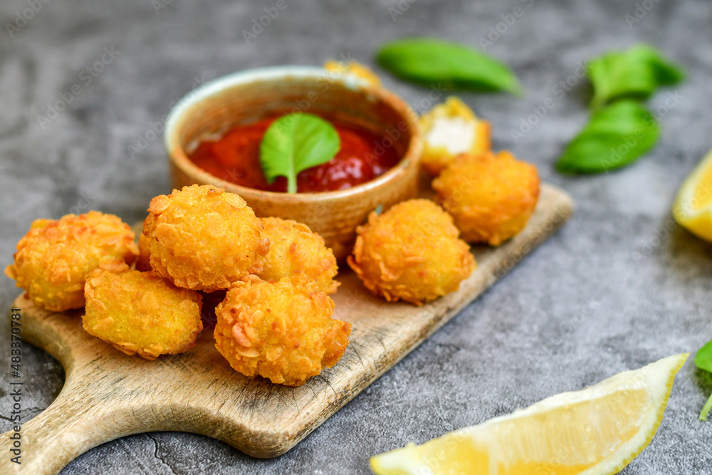 Crispy deep fried chicken popcorn nuggets . Breaded with Cornflakes ...