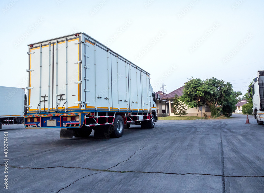 Rear and side view of Container truck Stock Photo | Adobe Stock