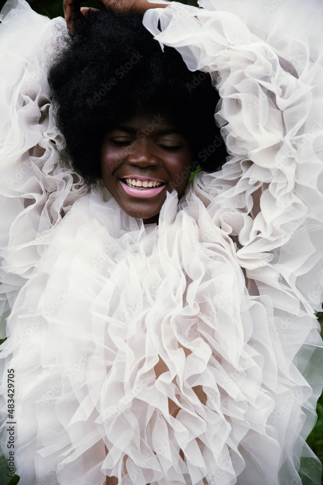 African beautiful model with perfect body in cerulean bodysuit ...