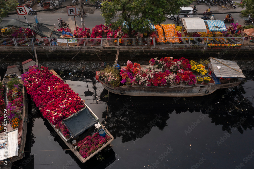 Vietnamese Lunar New Year floating flower market in Ho Chi Minh City is ...