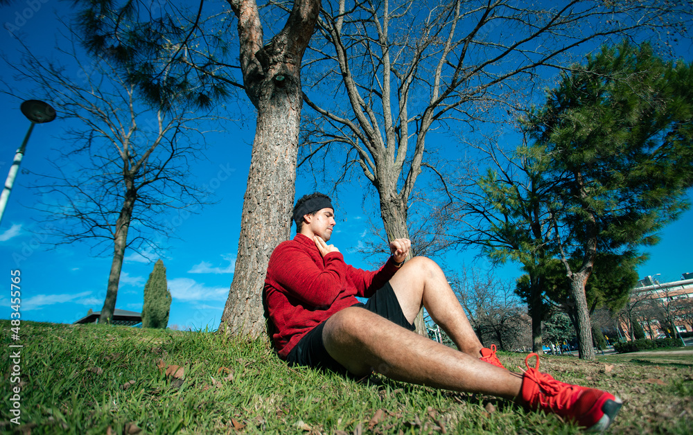 Series Running man with red shoe. Detail of the legs in wide angle of a ...