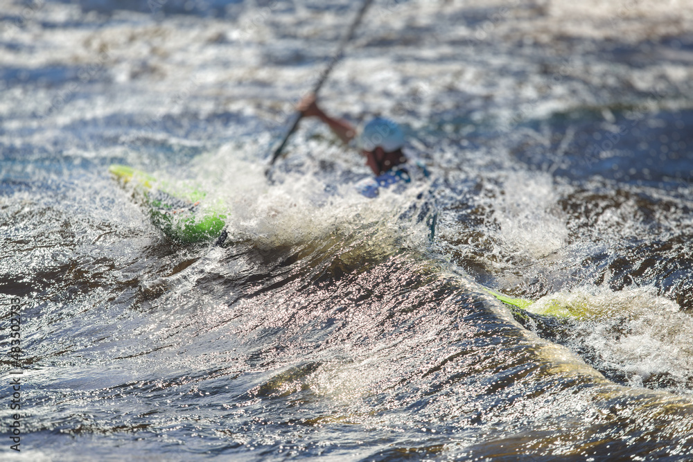 Kayak slalom canoe race in white water rapid river, process of kayaking ...