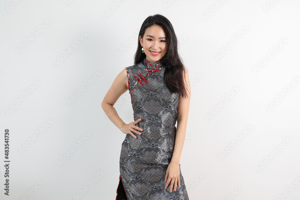Beautiful young elegant southeast Asian woman wearing modern Chinese ...