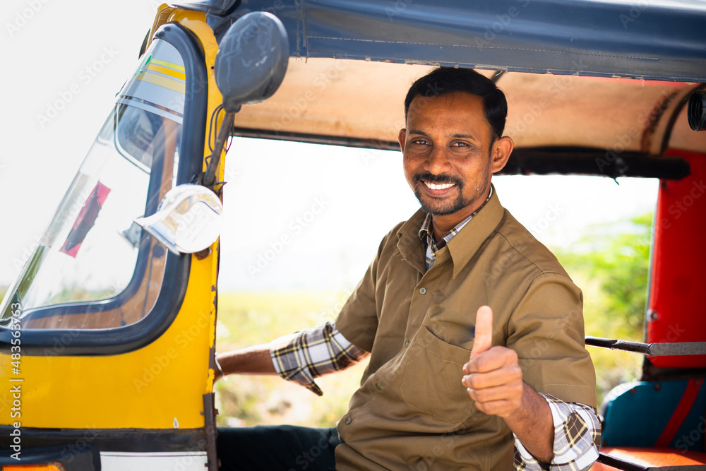 Auto rickshaw driver showing thumbs up while on auto - concept of ...