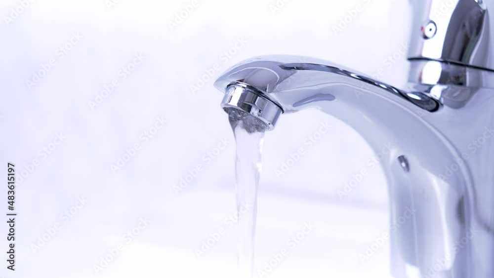 Water tap, stainless steel faucet in 4K VIDEO. Drop drip in bathroom ...