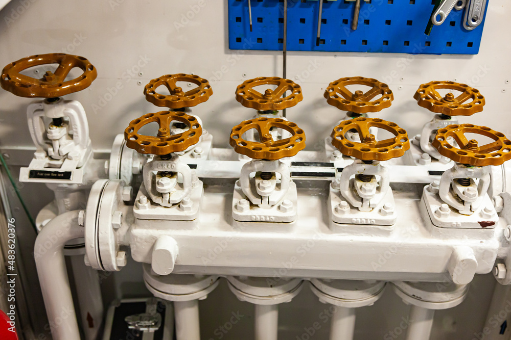 Hydraulic valve system in the ship's engine room. Stock Photo | Adobe Stock