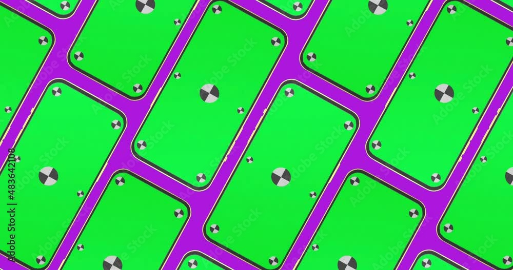 Phone with green screen and marks for tracking on violet very peri ...
