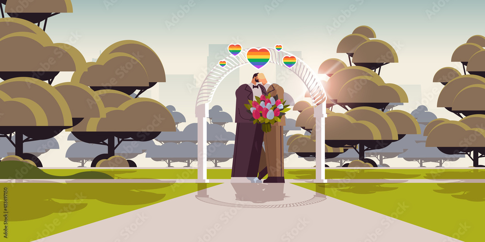 Newlywed Gay Couple With Flowers Kissing Near Wedding Arch Transgender