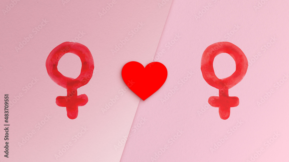 Red female gender symbols and heart on light pink papers. Concept ...