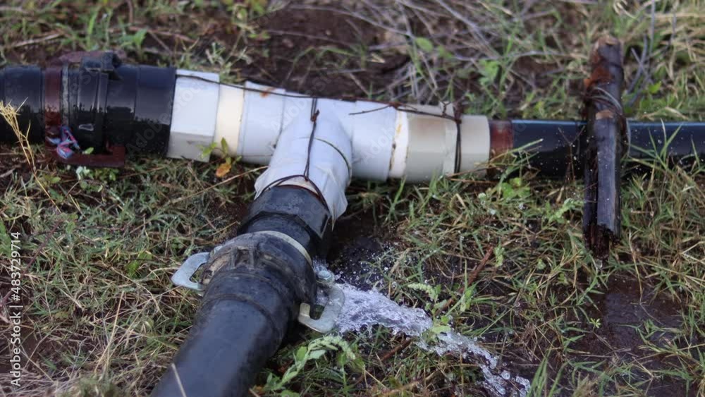 Three water pipes are used to in farmland Water dripping from a leaky ...