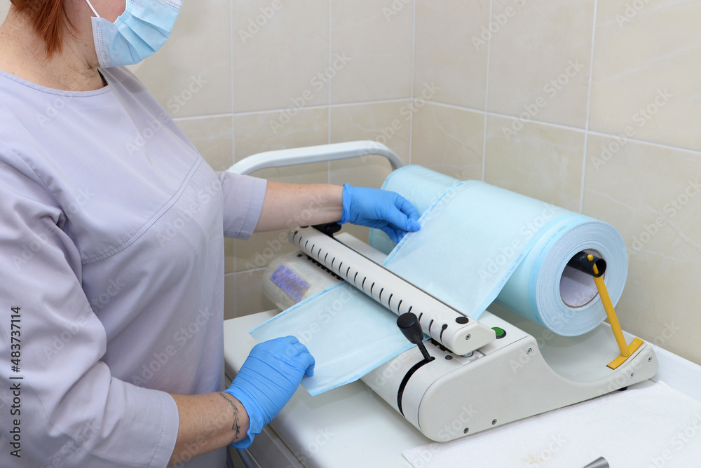 Equipment for packaging and sterilization of used medical instruments ...