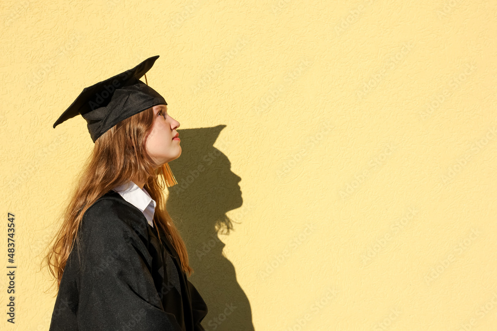 Cute teenage graduate girl laughing and having fun. No school, back to ...