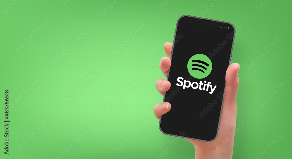 Vetor de Woman hand holding the smartphone with logo Spotify, vector ...