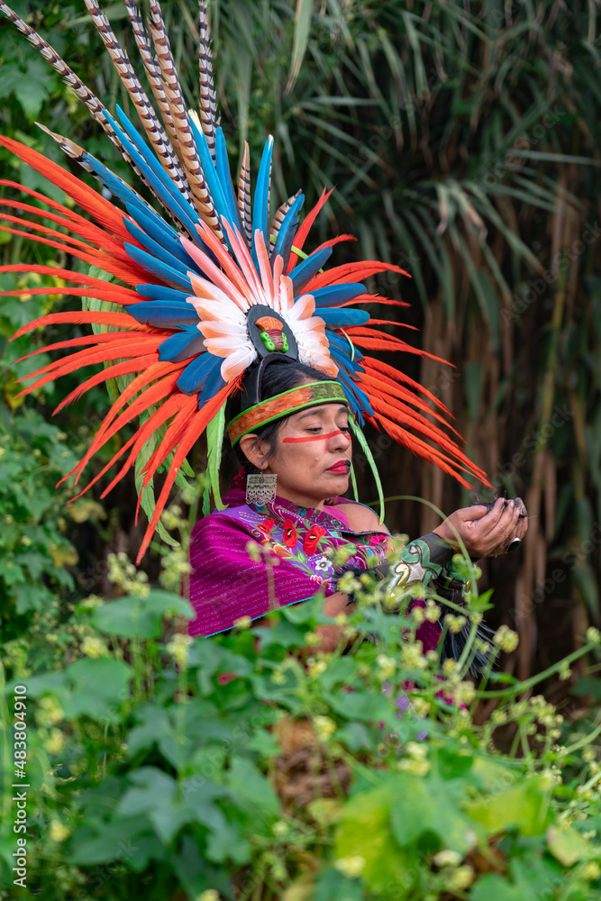 Aztec dancer in the field also known as "Chinampa" in Xochimilco ...