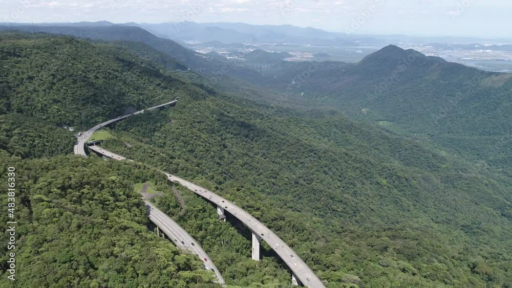 Video „Panning wide of landmark highway road at green forest trees and ...