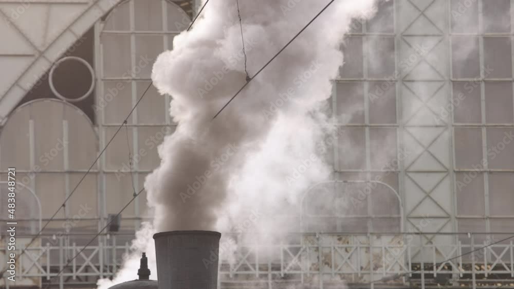 Steam pipe of steam locomotive of railway. Factory pipe of steam ...
