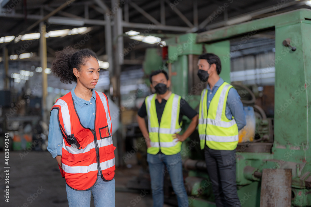 Professional engineering woman worker walk and check in warehouse ...