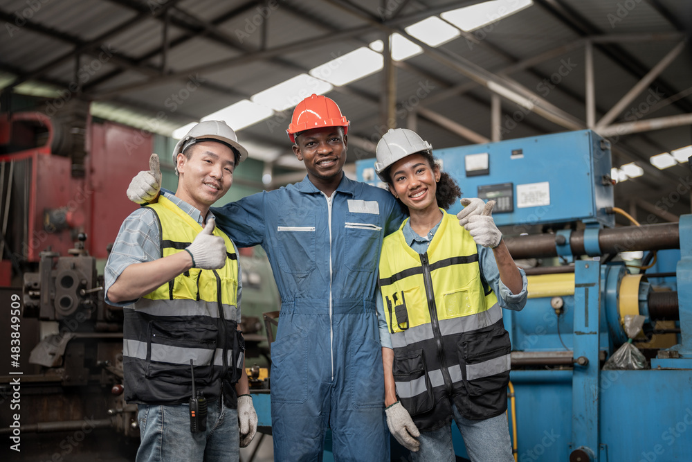 Group of Diversity factory worker people standing when success the ...