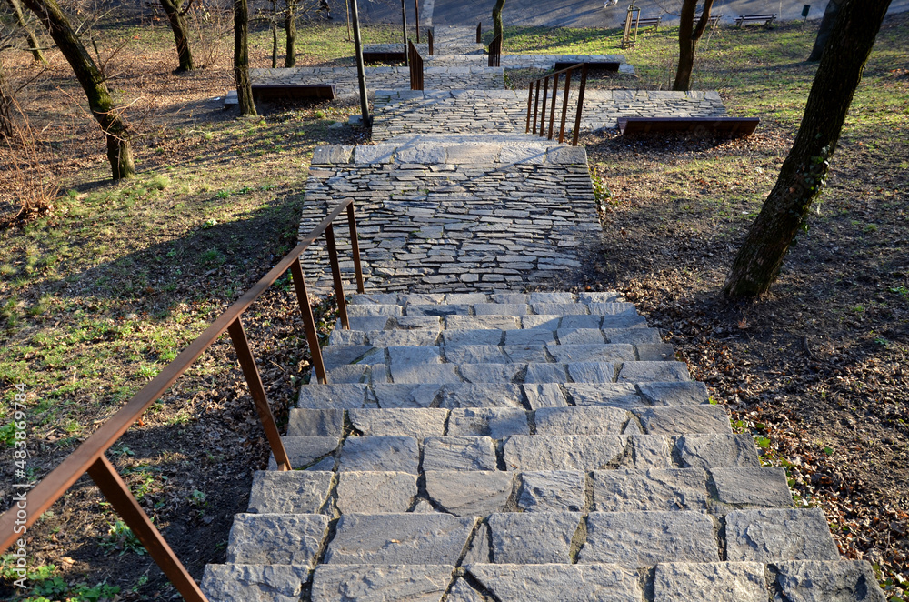 staircase with rest areas. in the park it leads directly from the slope ...