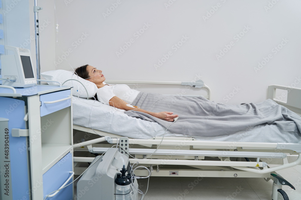 Caucasian female patient connected to oxygen concentrator Stock Photo ...