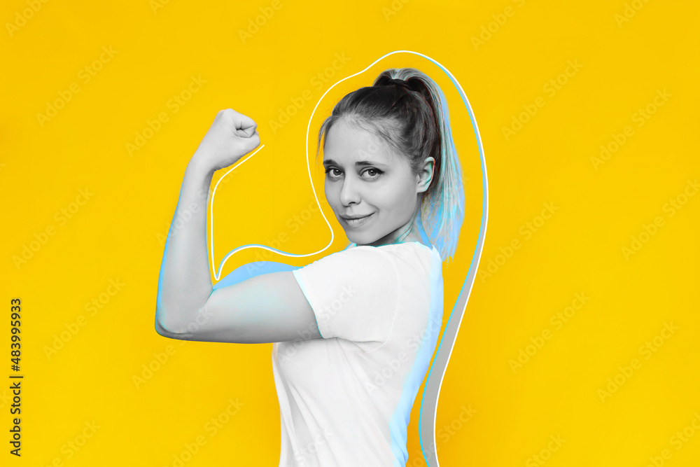 Strong powerful confident caucasian young blonde woman raises arm and ...