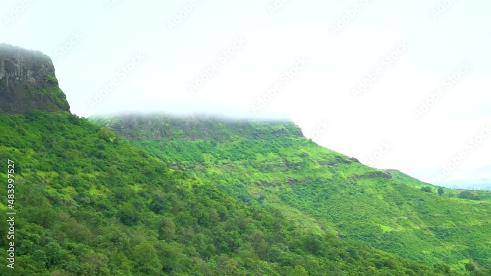 Clouds covering the Governer hill of the Saputara as seen from Saputara ...
