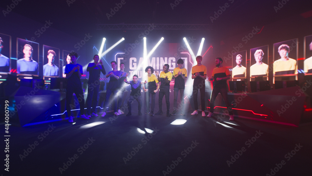 Group of teammates esport gamers walking and clapping hands then ...