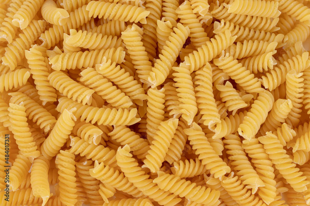 Variety of types and shapes of dry Italian pasta. Background. Stock ...