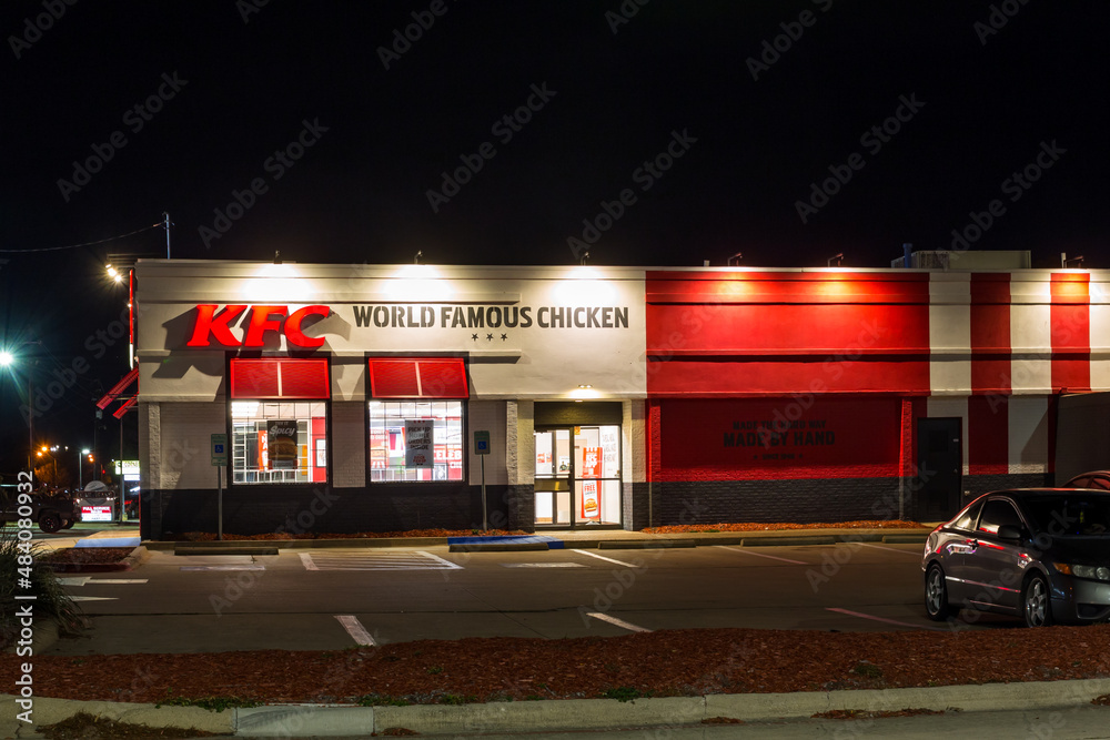 KFC World Famous Chicken restaurant in Plano, Texas, illuminated at ...