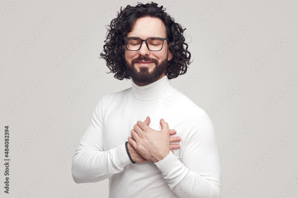 Content man expressing tender feelings Stock Photo | Adobe Stock