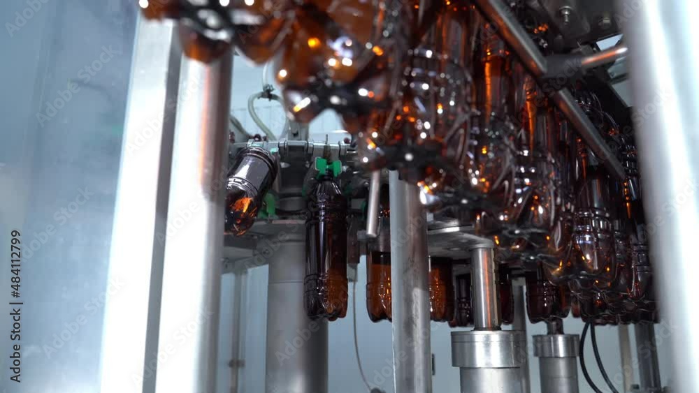 Alcohol factory. Technological line for bottling of beer in brewery ...