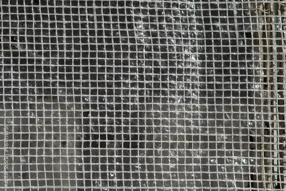 Texture of plastic mesh. Squares of white threads. Selective foc Stock ...