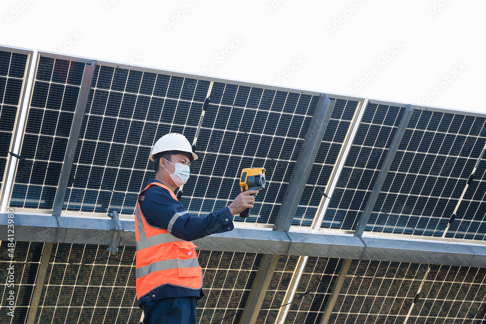 The technician takes the Thermoscan(thermal image camera) scan to the ...
