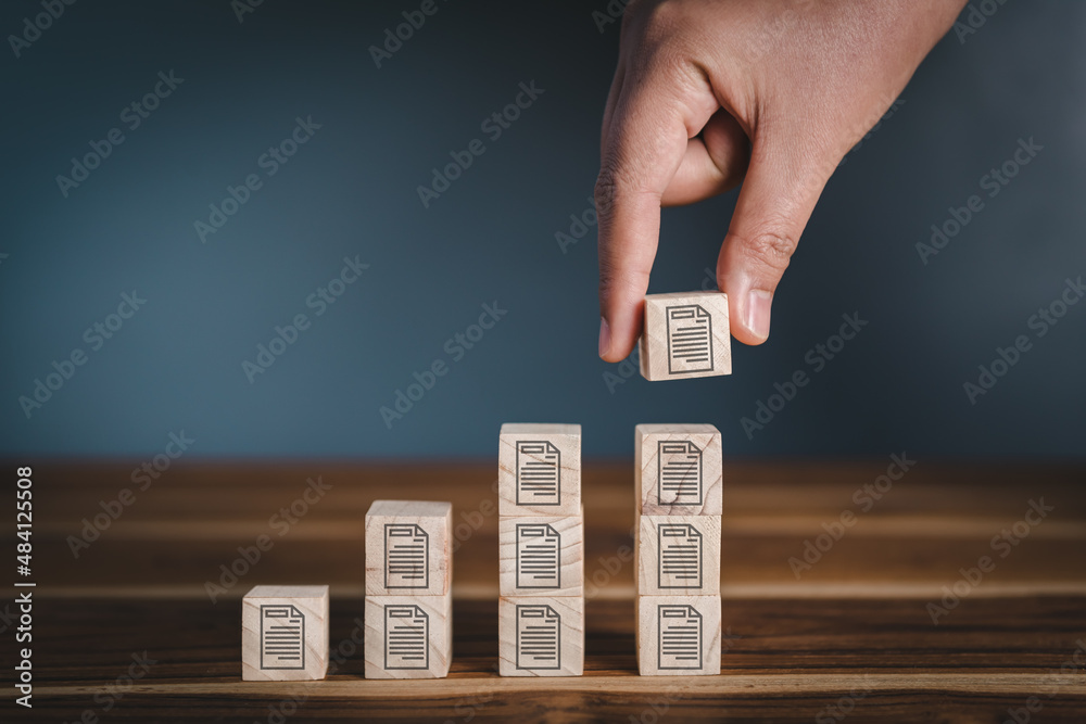 Database Documentation Files Management Trend Concept, Hand is Putting ...