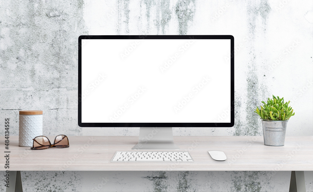 Computer display on office desk with isolated screen for mockup, wep ...